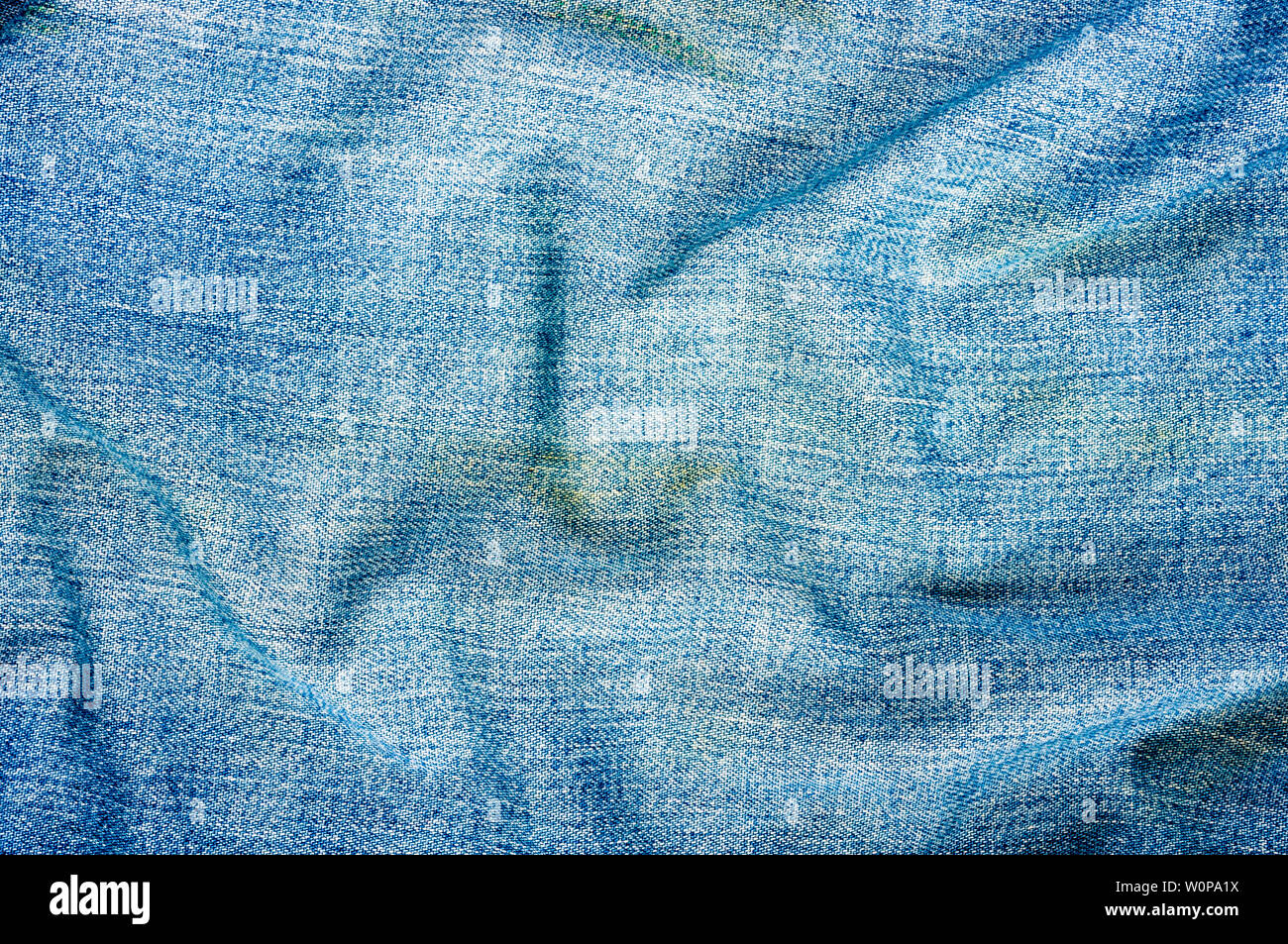 clothing items blue washed faded jeans cotton fabric texture with seams ...