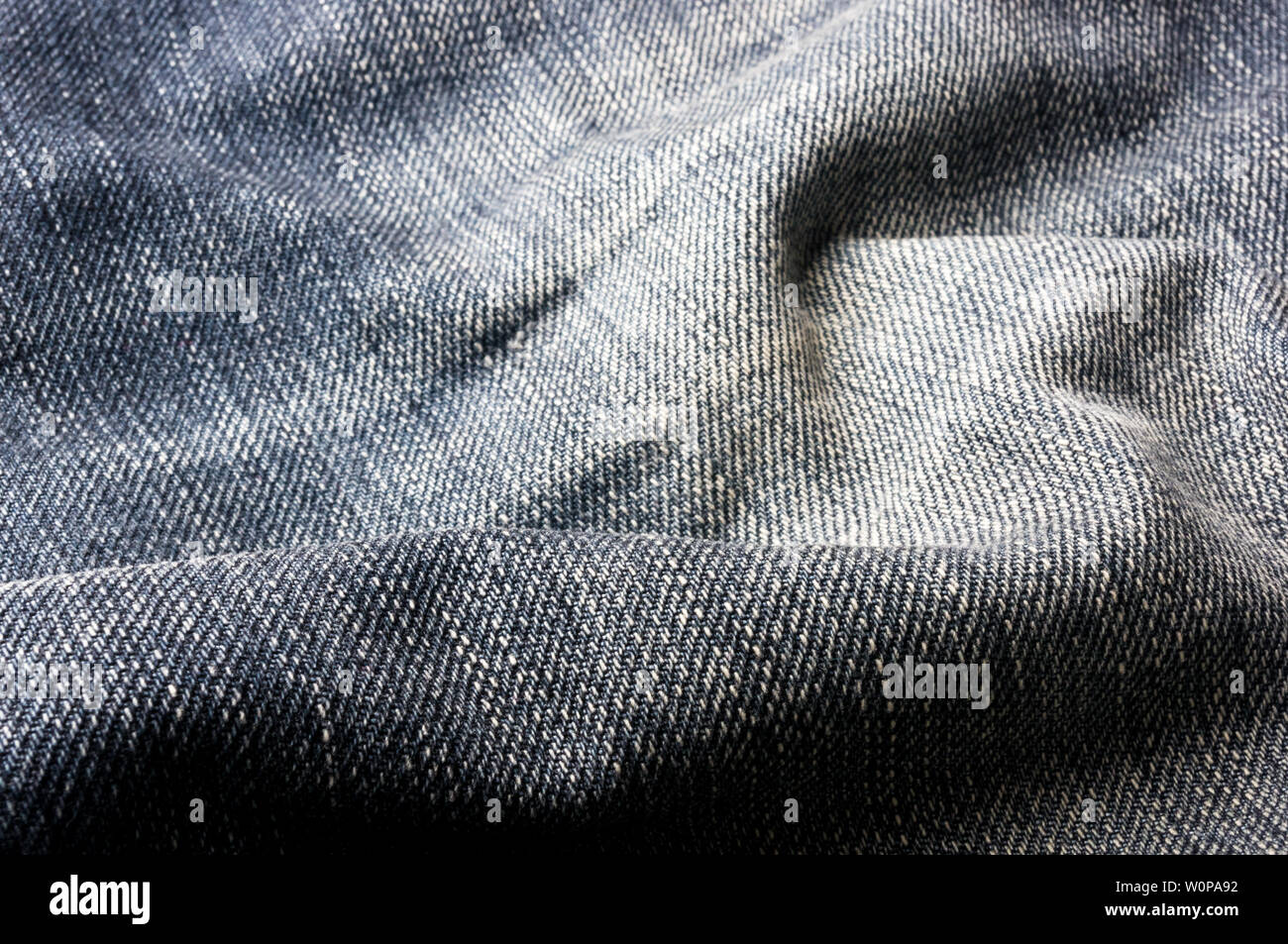 clothing items blue washed faded jeans cotton fabric texture with seams ...