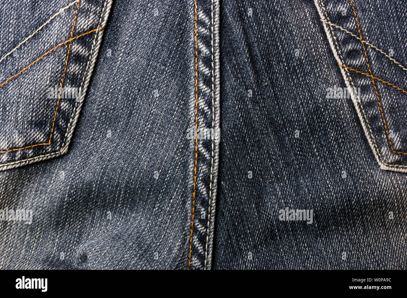 clothing items blue washed faded jeans cotton fabric texture with seams ...