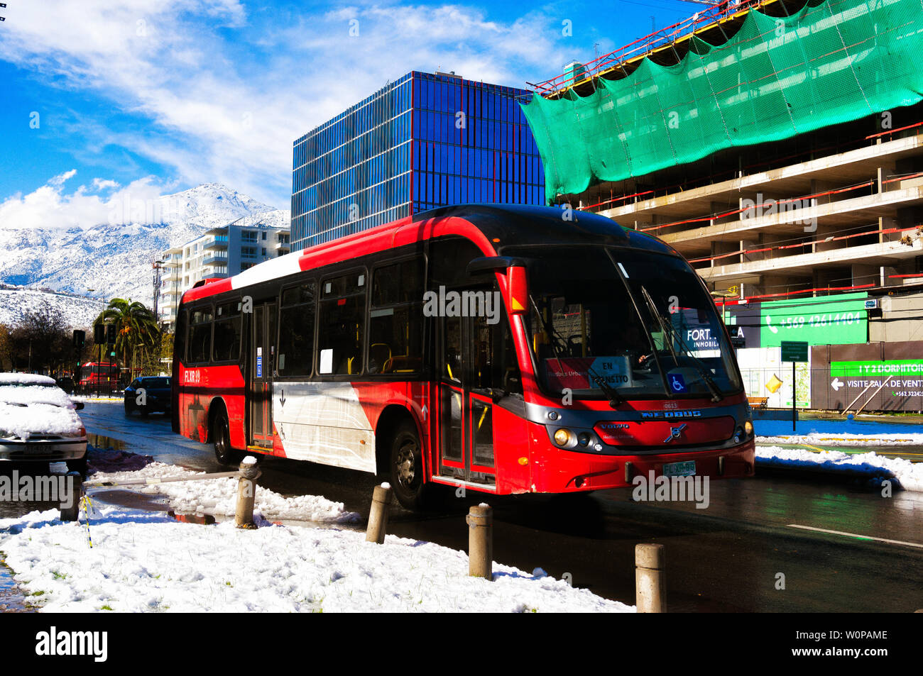 SANTIAGO, CHILE - JULY 2017: A Transantiago bus after a snowy morning ...