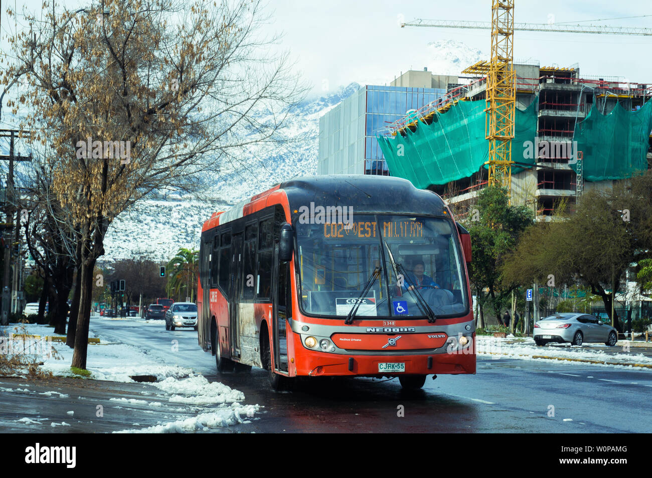 SANTIAGO, CHILE - JULY 2017: A Transantiago bus after a snowy morning ...