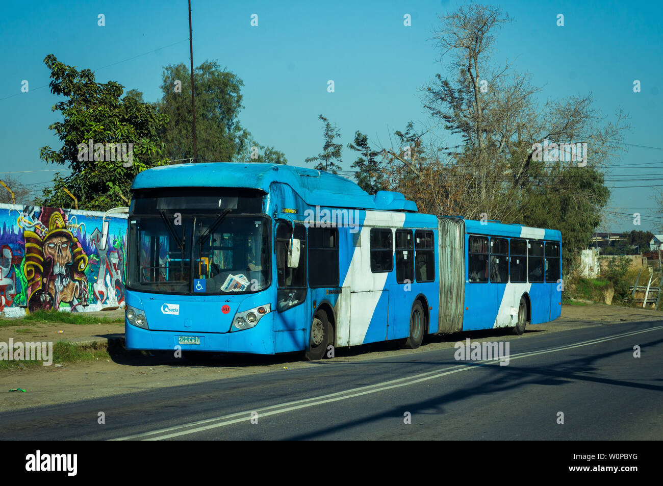 SANTIAGO, CHILE - JULY 2018: An articulated Transantiago bus stopped ...