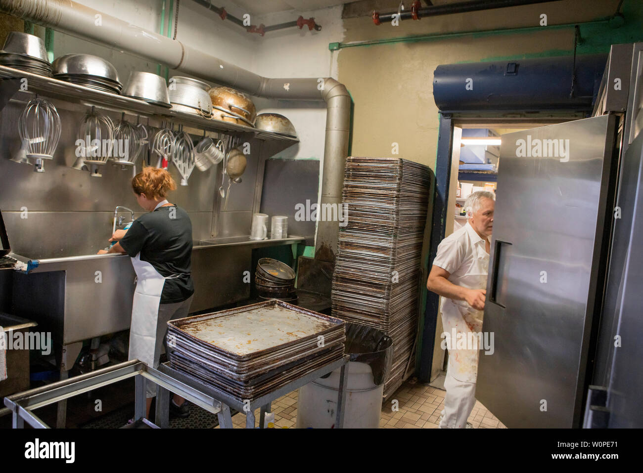 Woman in industrial kitchen hi-res stock photography and images - Alamy