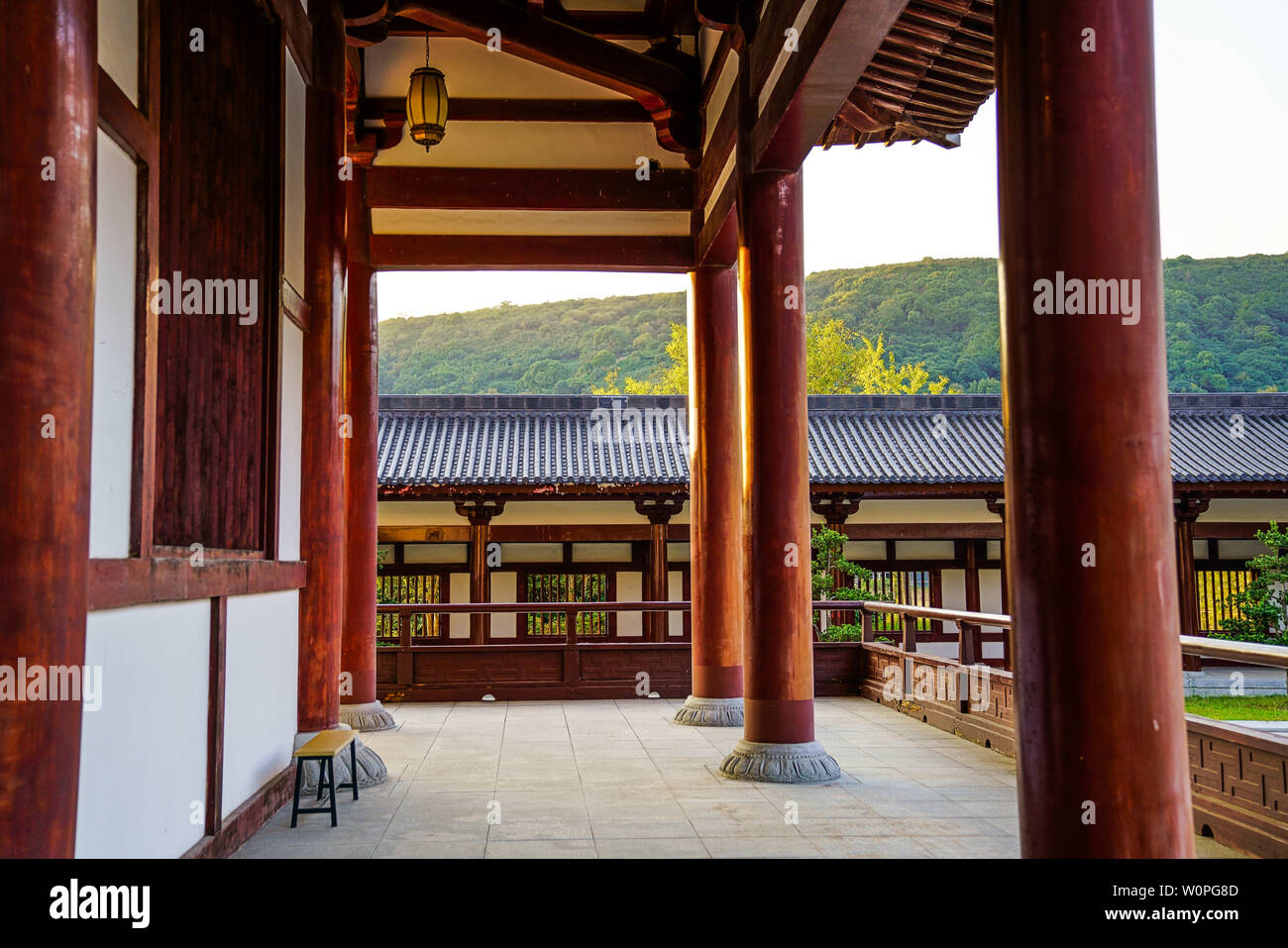 Sun light ancient trees and roofs hi-res stock photography and images ...