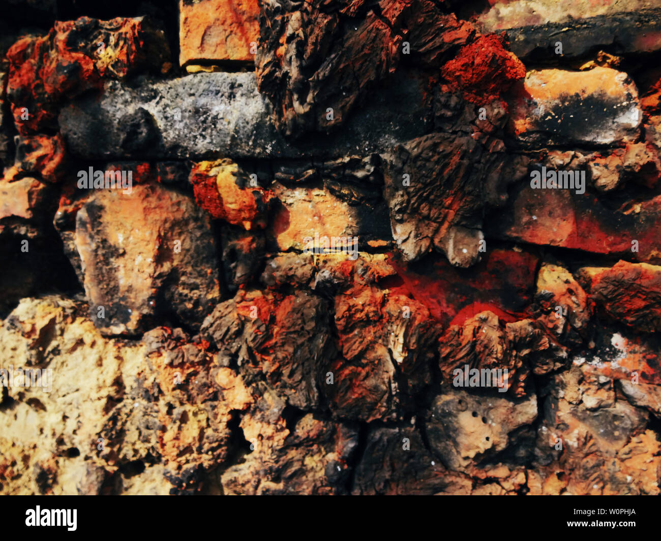 Burned red brick walls Stock Photo - Alamy