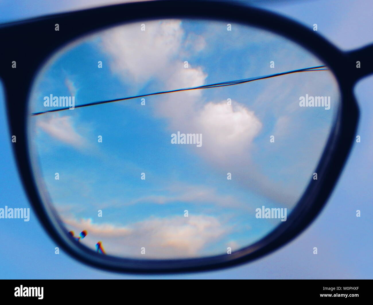 Look at the world through glasses Stock Photo - Alamy