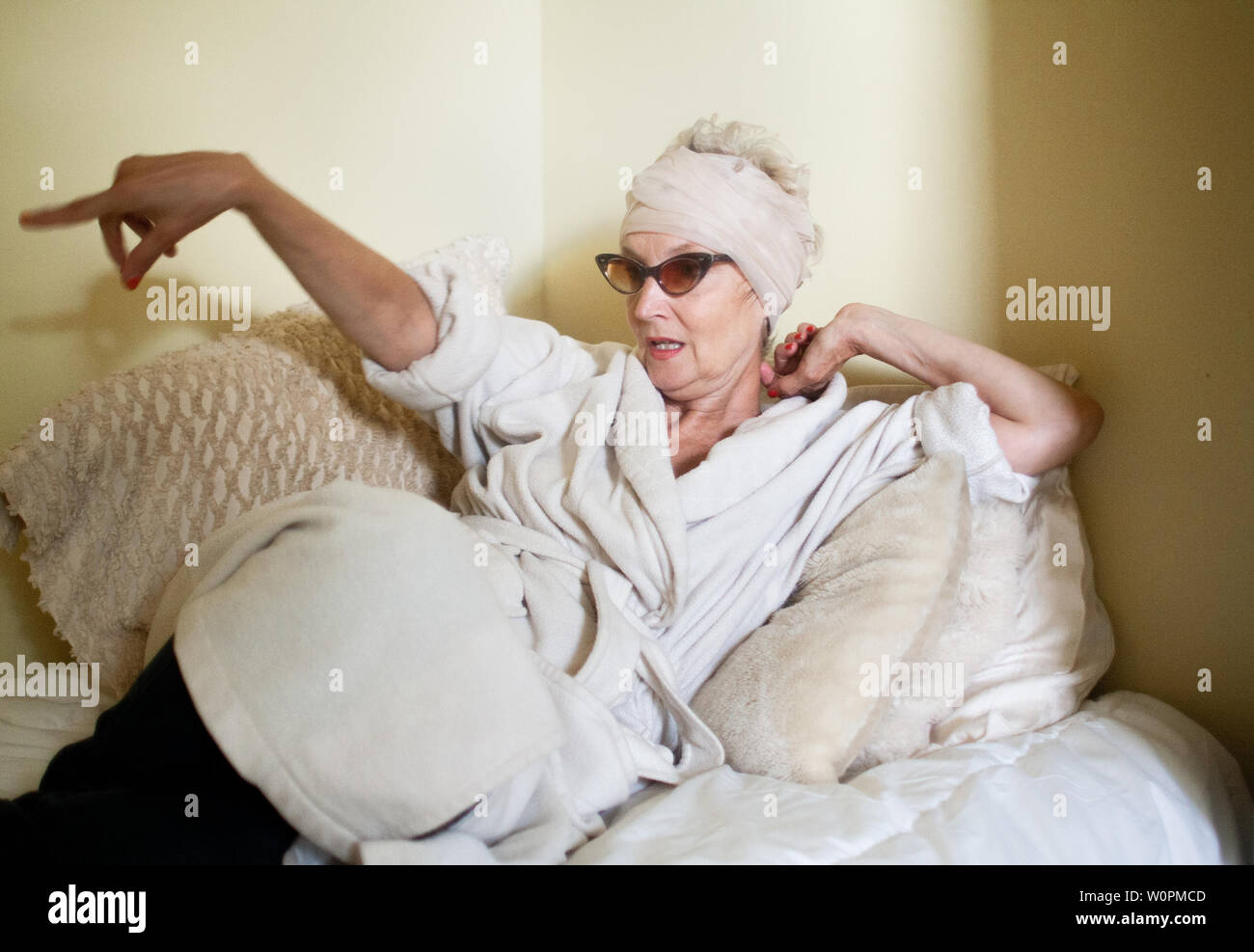 Old woman wearing a robe hi-res stock photography and images - Alamy