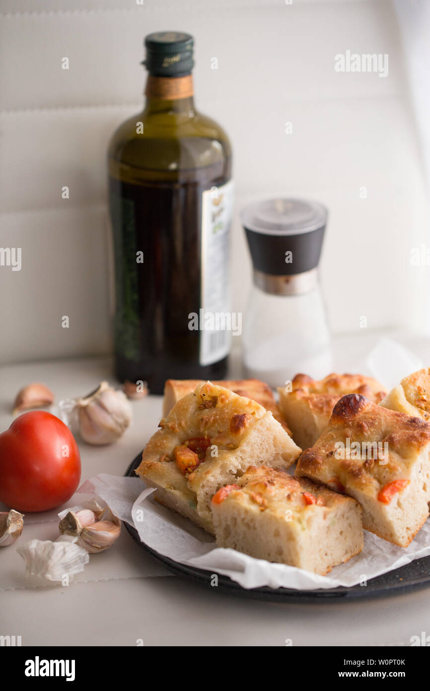 Handmade bread baked sliced garlic tomatoes italian forcacha focaccia ...