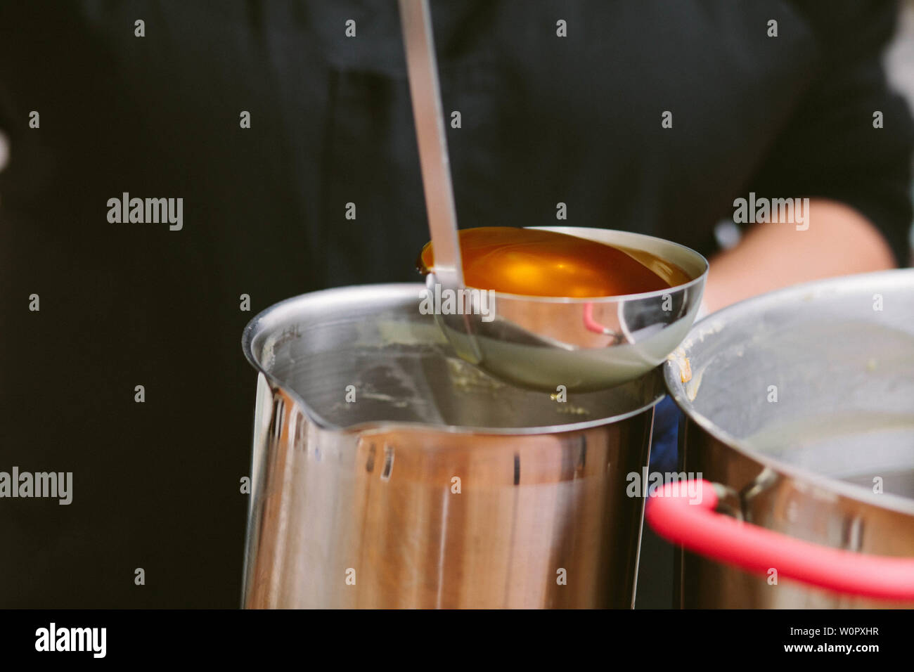 Ladling hi-res stock photography and images - Alamy