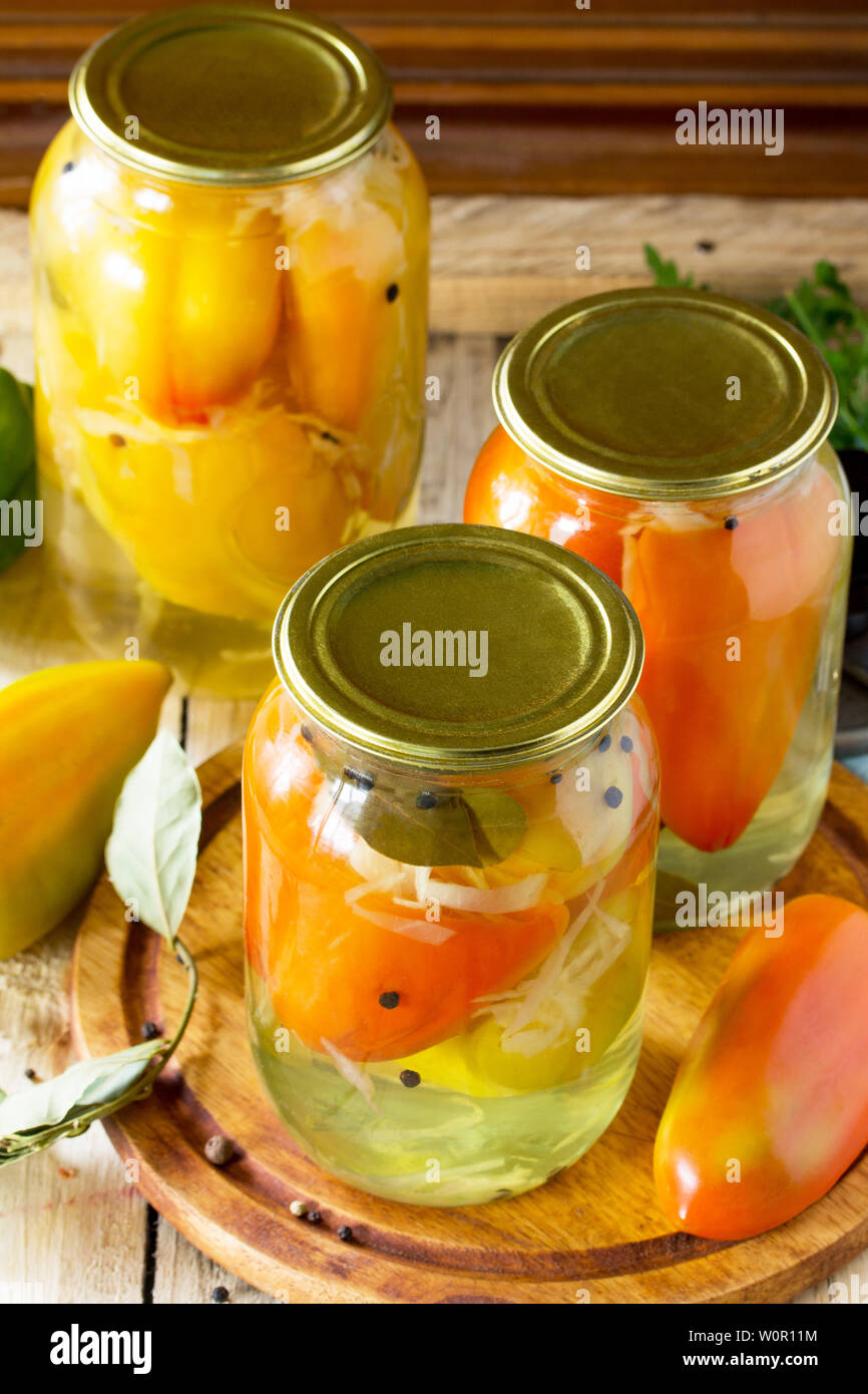 Homemade preserving. Bulgarian Pepper stuffed with vegetables in ...