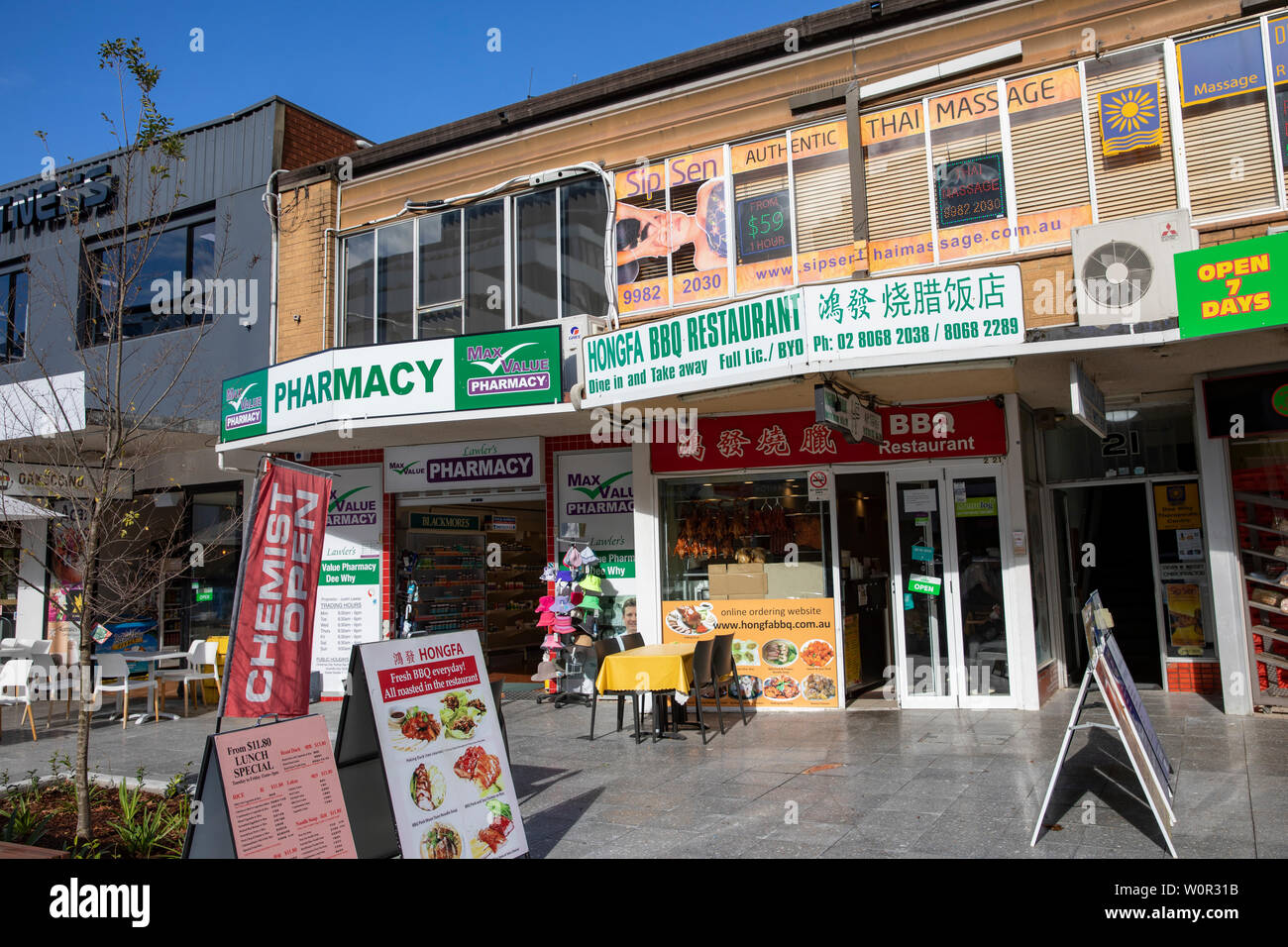 Pharmacy and row of shops in Dee Why a suburb of Sydney,Australia Stock ...