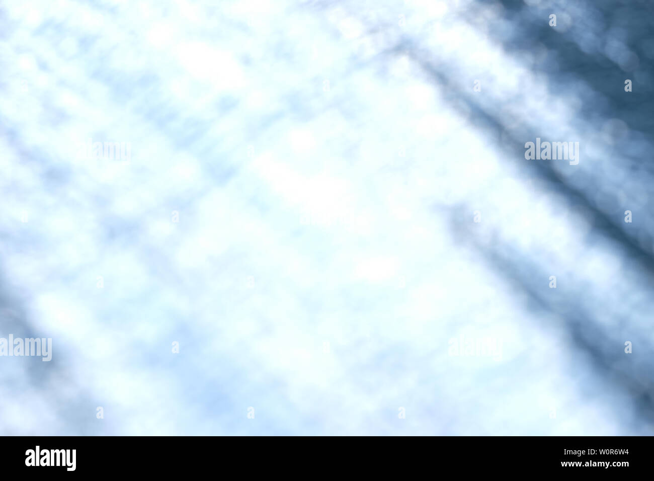 Bright abstract glare background. Grey, blue and white blurry backdrop ...