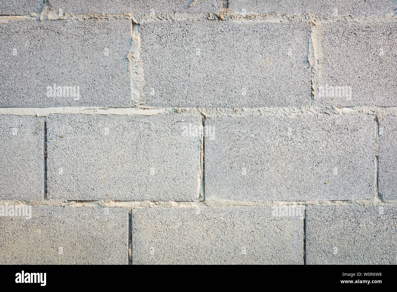 old concrete block wall background texture Stock Photo - Alamy