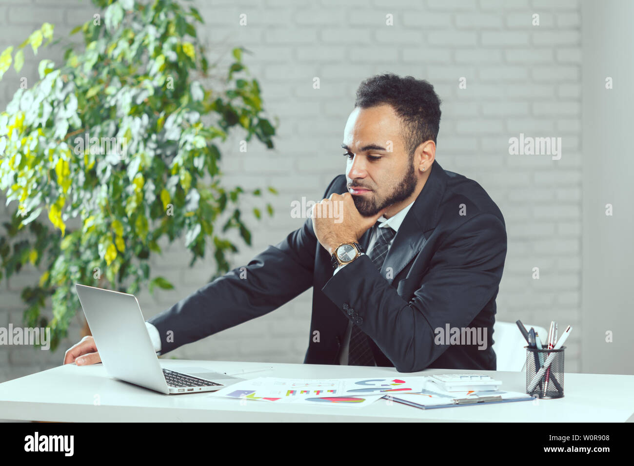 Business man working at office Stock Photo - Alamy