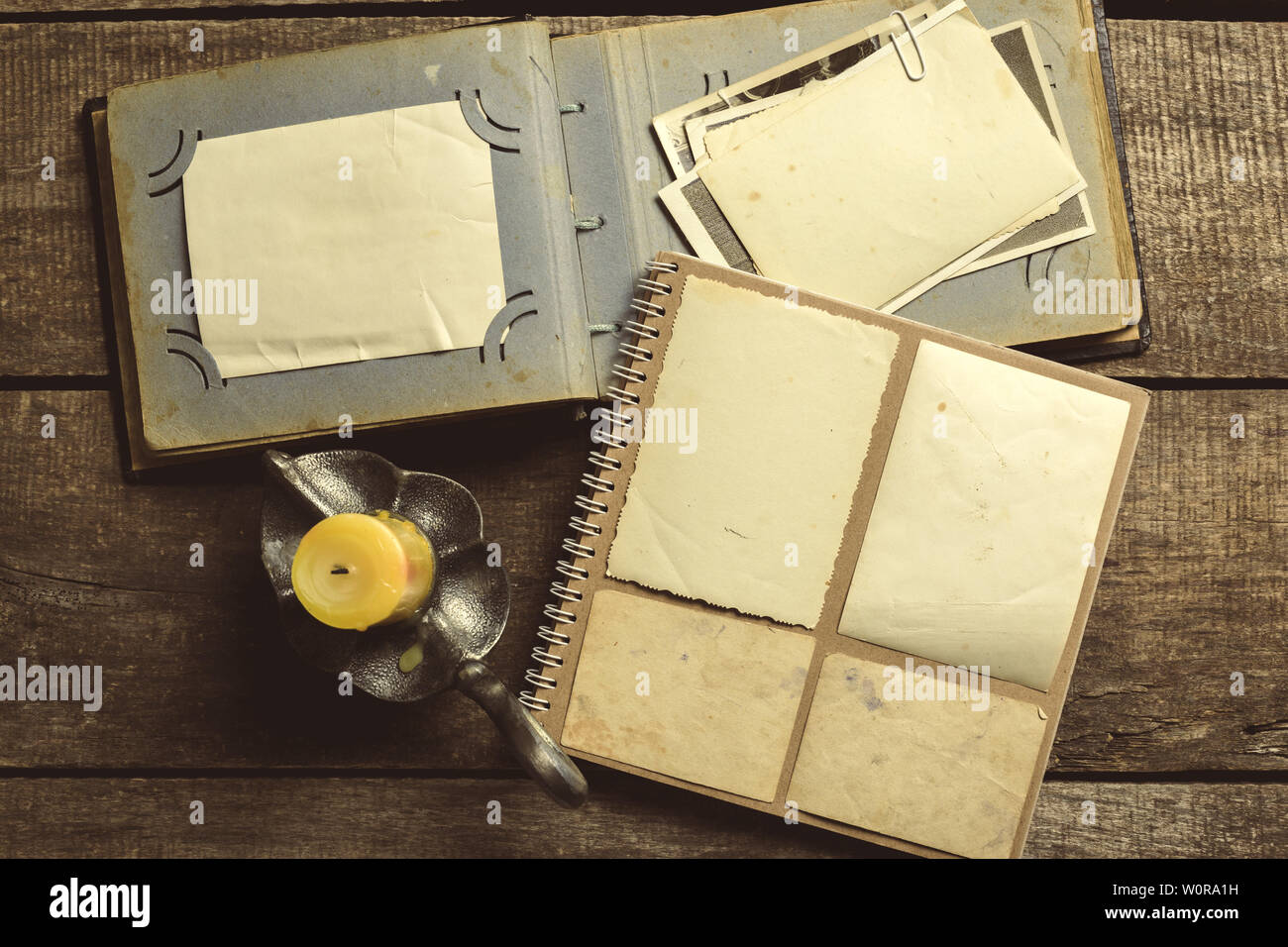 old photos on the wooden table Stock Photo - Alamy