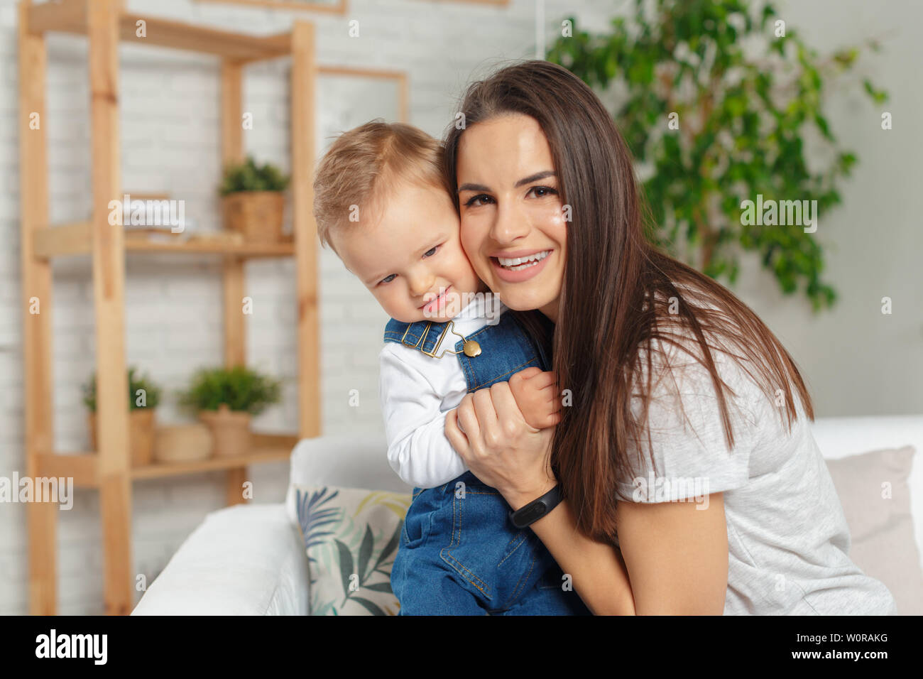 Family at home relaxing Stock Photo - Alamy
