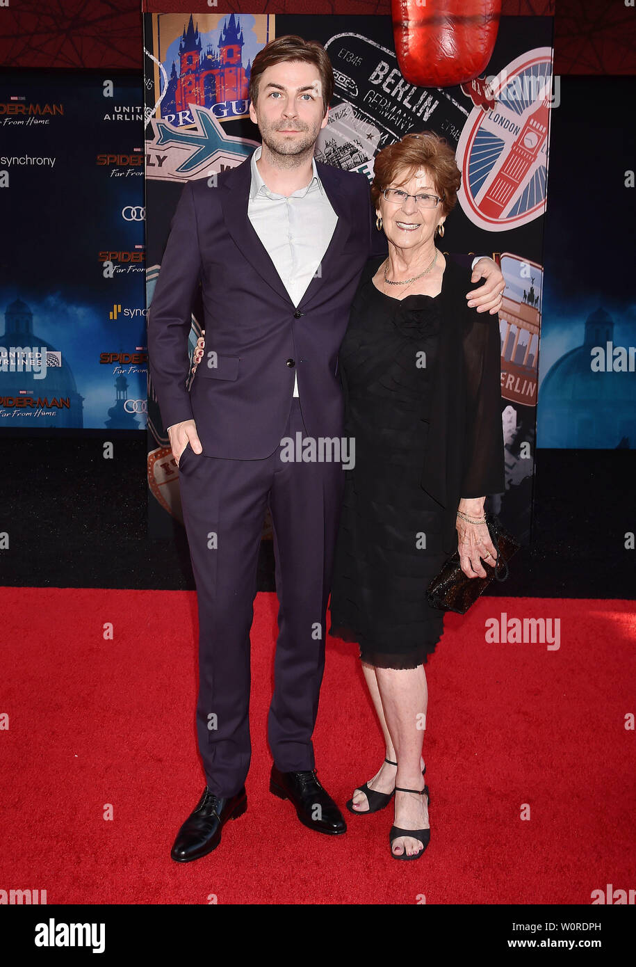 HOLLYWOOD, CA - JUNE 26: Director Jon Watts and his mother attend the ...
