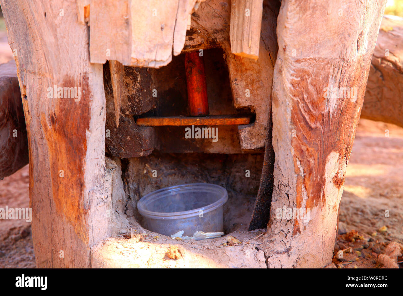 Oil extraction, ancient oil extraction technology Stock Photo - Alamy