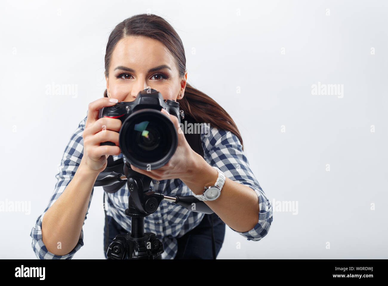 Woman photographer at work Stock Photo - Alamy