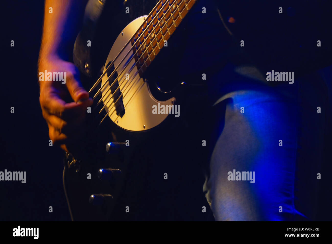 Bass guitar fingers on strings hi-res stock photography and images - Alamy