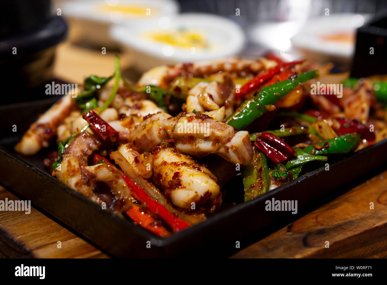 Iron squid cuisine Stock Photo - Alamy