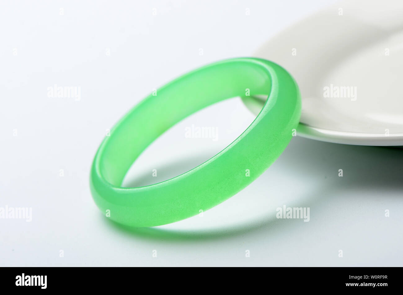 Still life picture of jade bracelet Stock Photo - Alamy