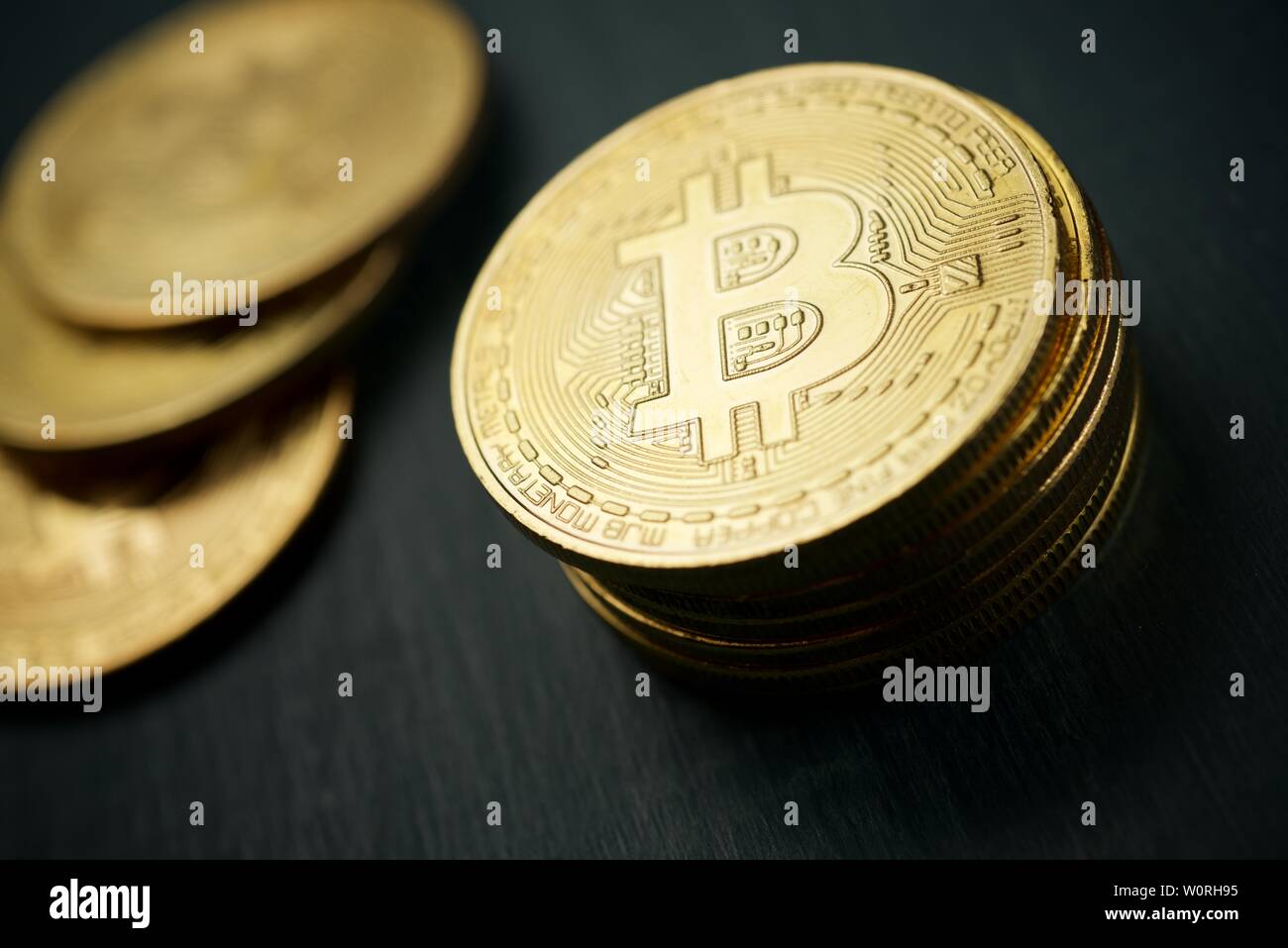 Bitcoins on a wood table Stock Photo - Alamy