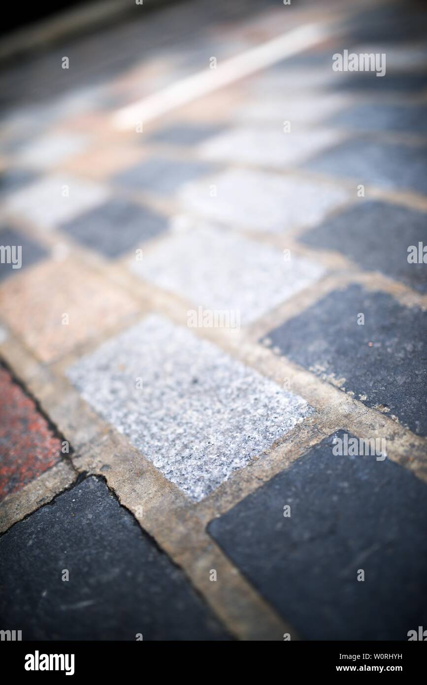 Floor of a street with stone tiles in London, England Stock Photo - Alamy