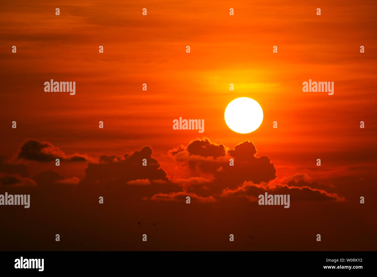 colorful heap red sunset cloud and sun on sky background Stock Photo ...