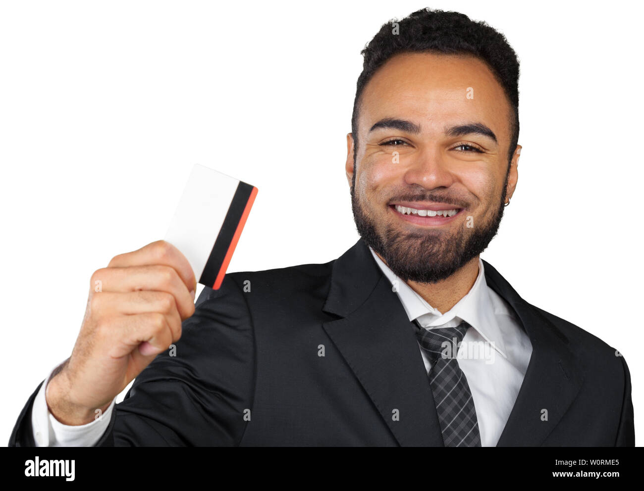 Happy smiling young man holding a credit card isolated on white ...