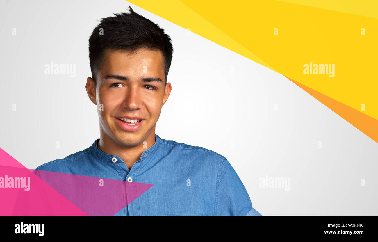 Handsome smiling young man Stock Photo - Alamy