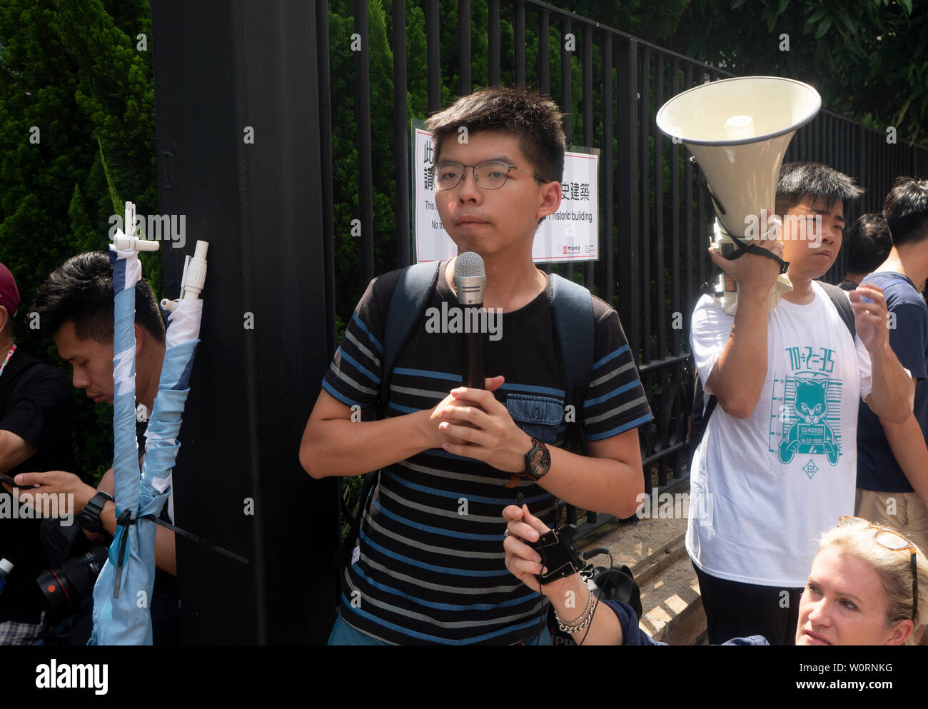Activist Joshua Wong Speaks In Front Of The Justice Department To A Few