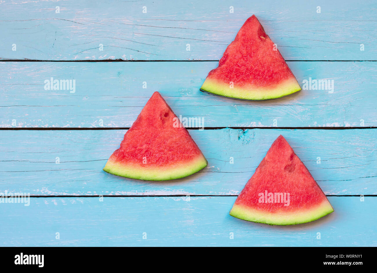 Fresh watermelon with air to musical notes blue wood background Stock ...