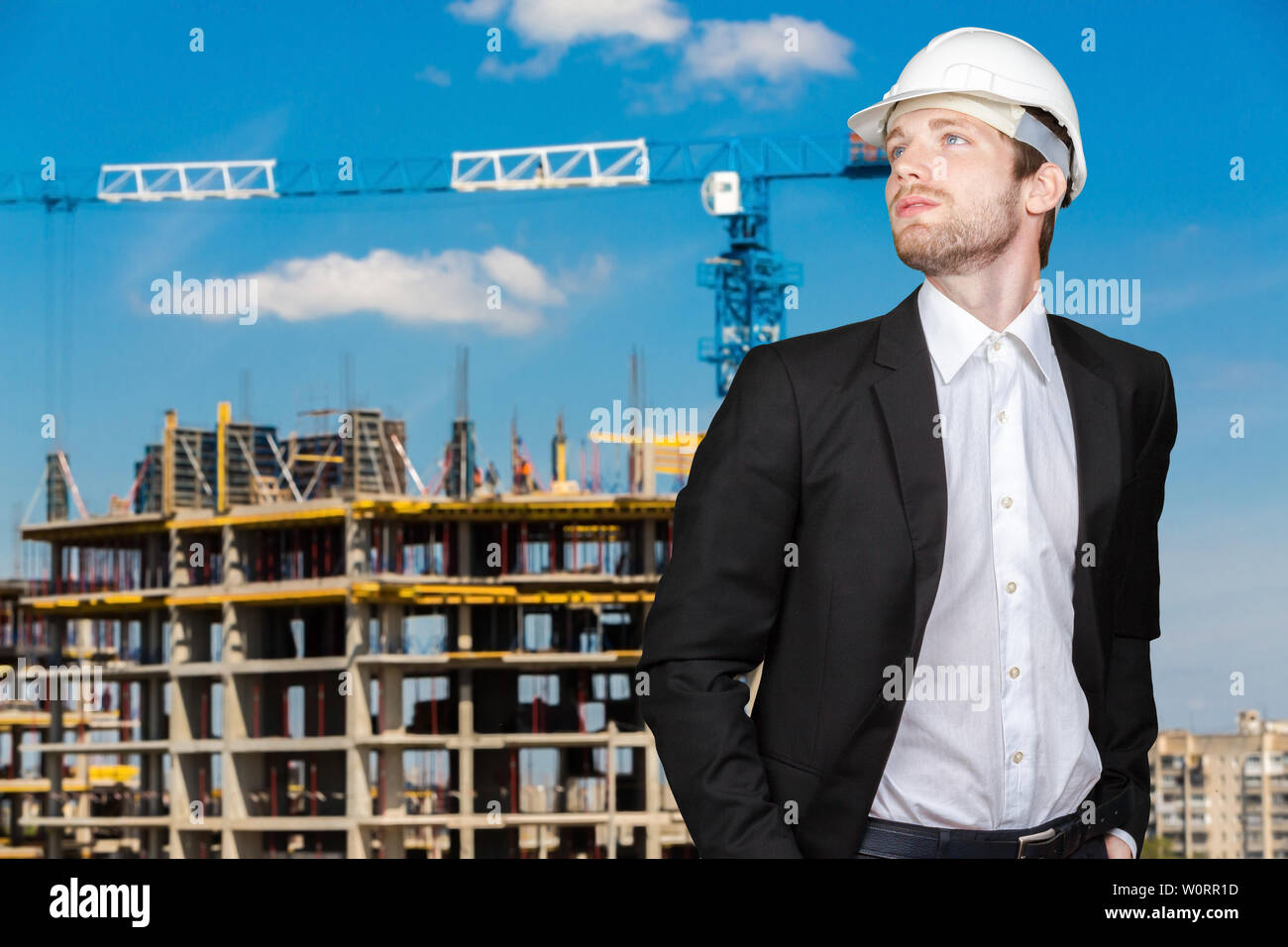 Successful male architect at a building site Stock Photo - Alamy