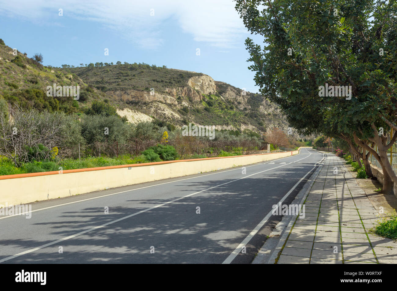 Driving on an empty road Stock Photo - Alamy