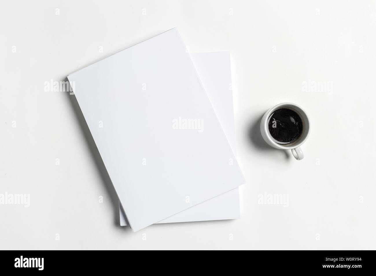 a4 paper and coffee cup Stock Photo - Alamy