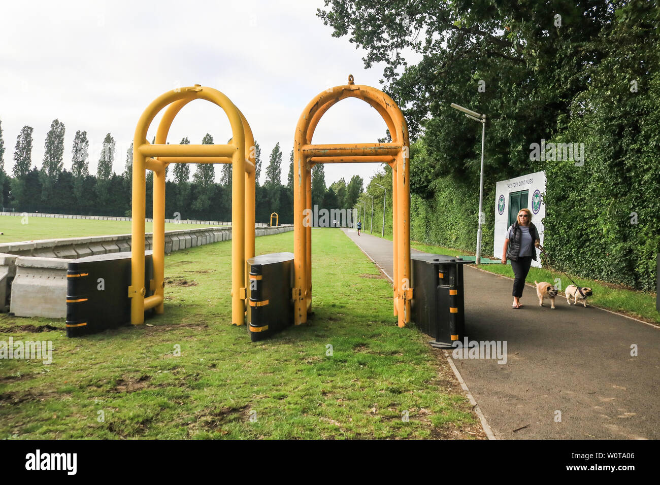 Wimbledon, London. UK . 28th June 2019. Concrete barriers and metal ...