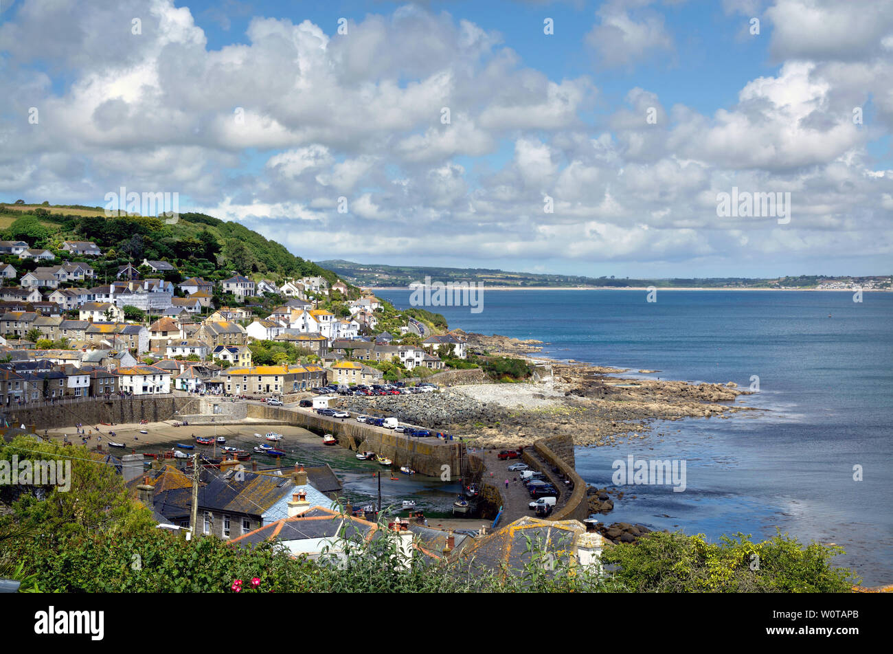 View of the little fishing village of Mousehole in Cornwall (UK) in ...