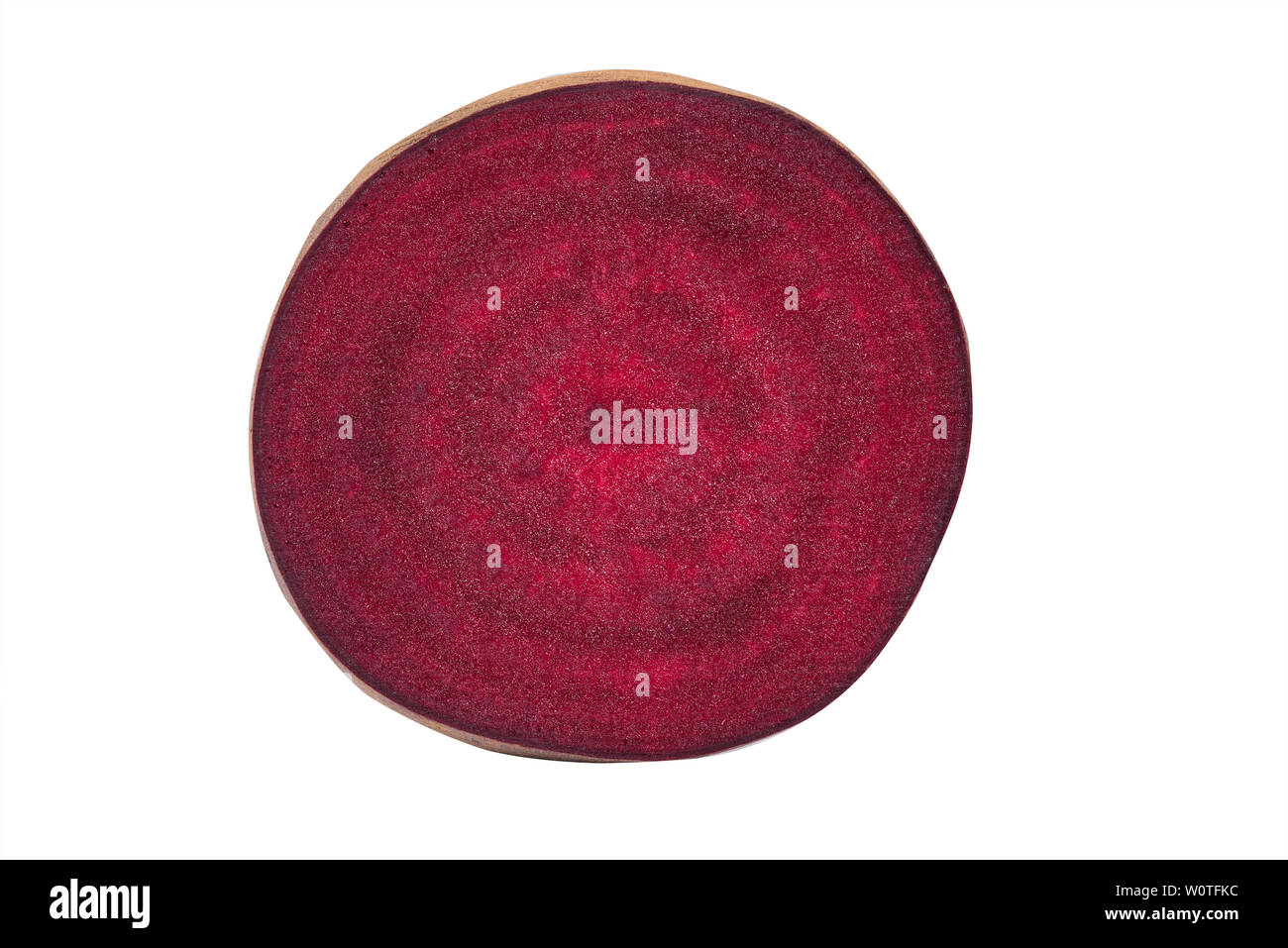 Red beetroot cut in half, photographed end on, white background Stock ...