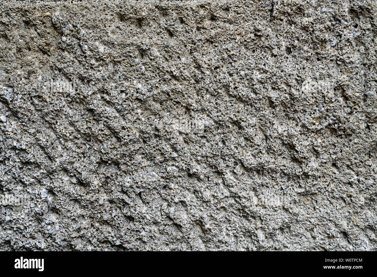 Hard crystalline metamorphic form of limestone, white with mottling and ...