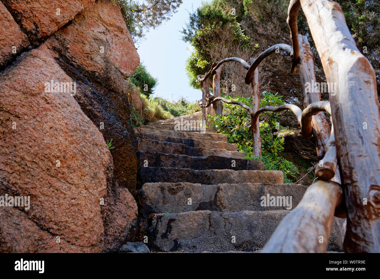 Magical stairs and wooden handrail at the red rock beach at Costa ...