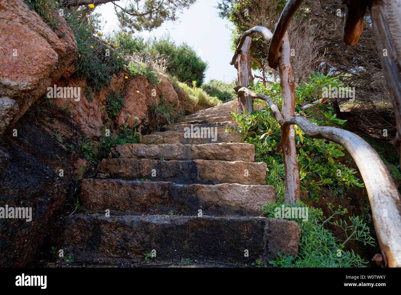 Magical stairs and wooden handrail at the red rock beach at Costa ...