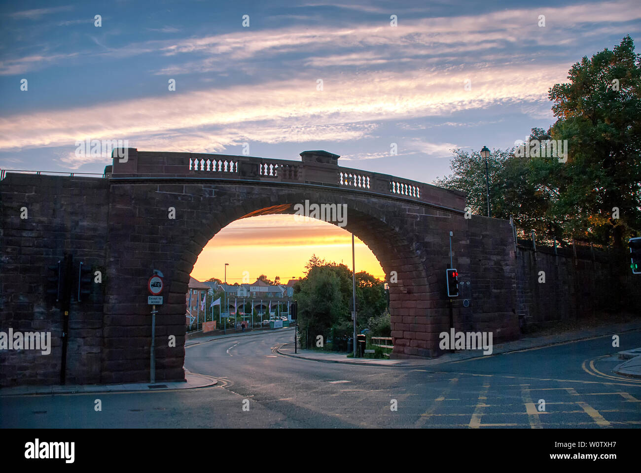 Sunset behind the Watergate arch bridge in Chester, UK Stock Photo - Alamy
