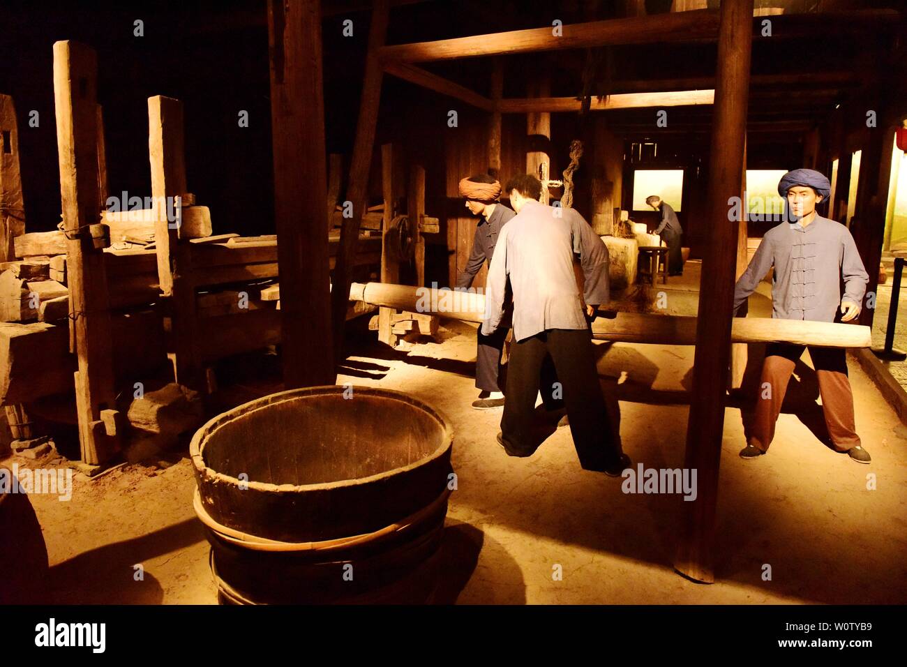 The ancient method of extracting oil Stock Photo - Alamy