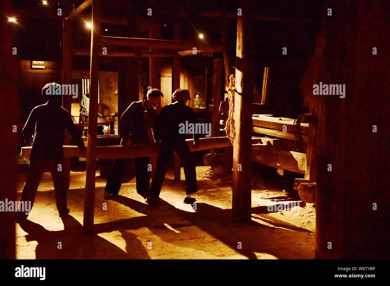 The ancient method of extracting oil Stock Photo - Alamy