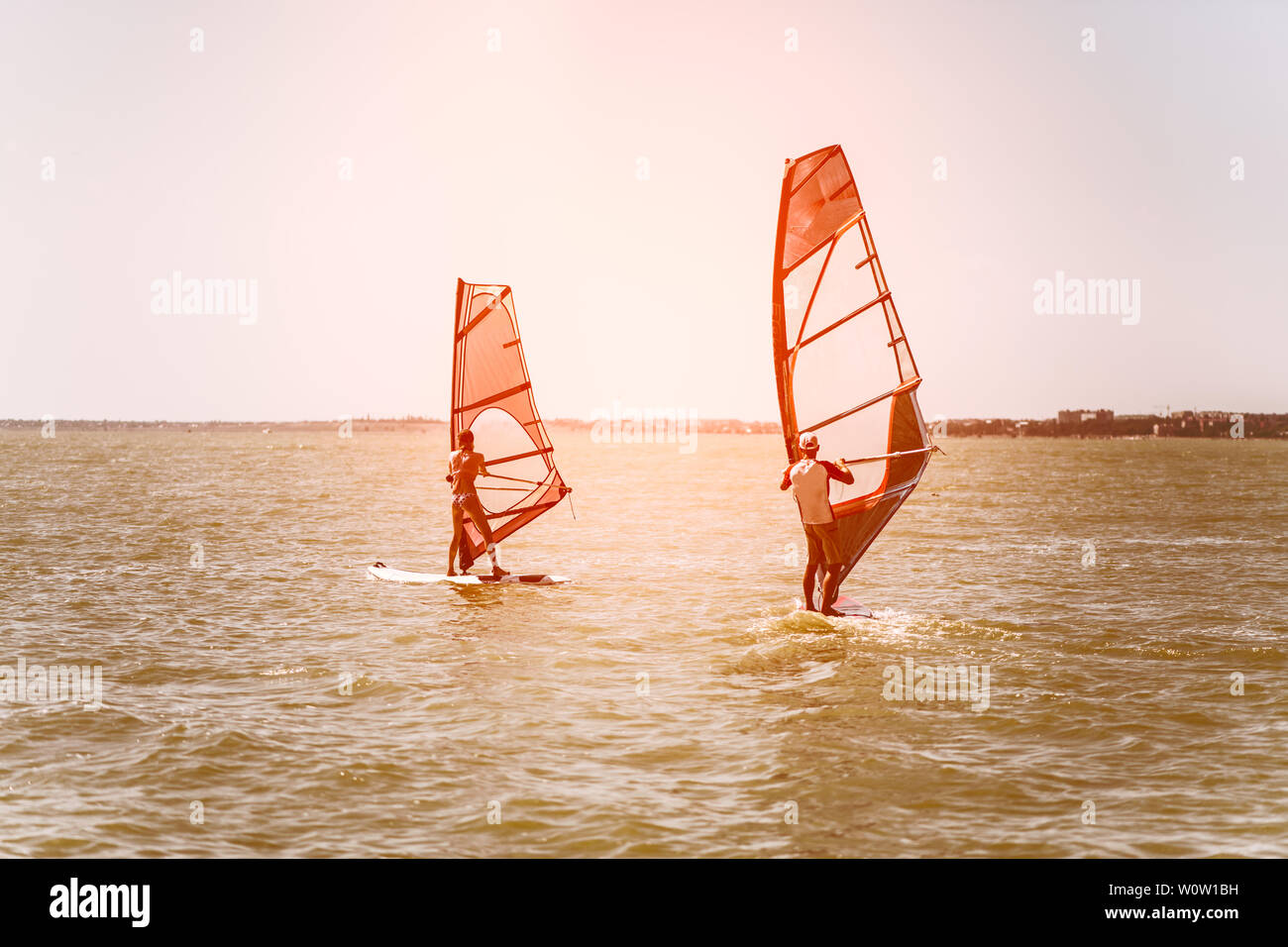 Romance in the sea couple man and woman together sailing on a ...