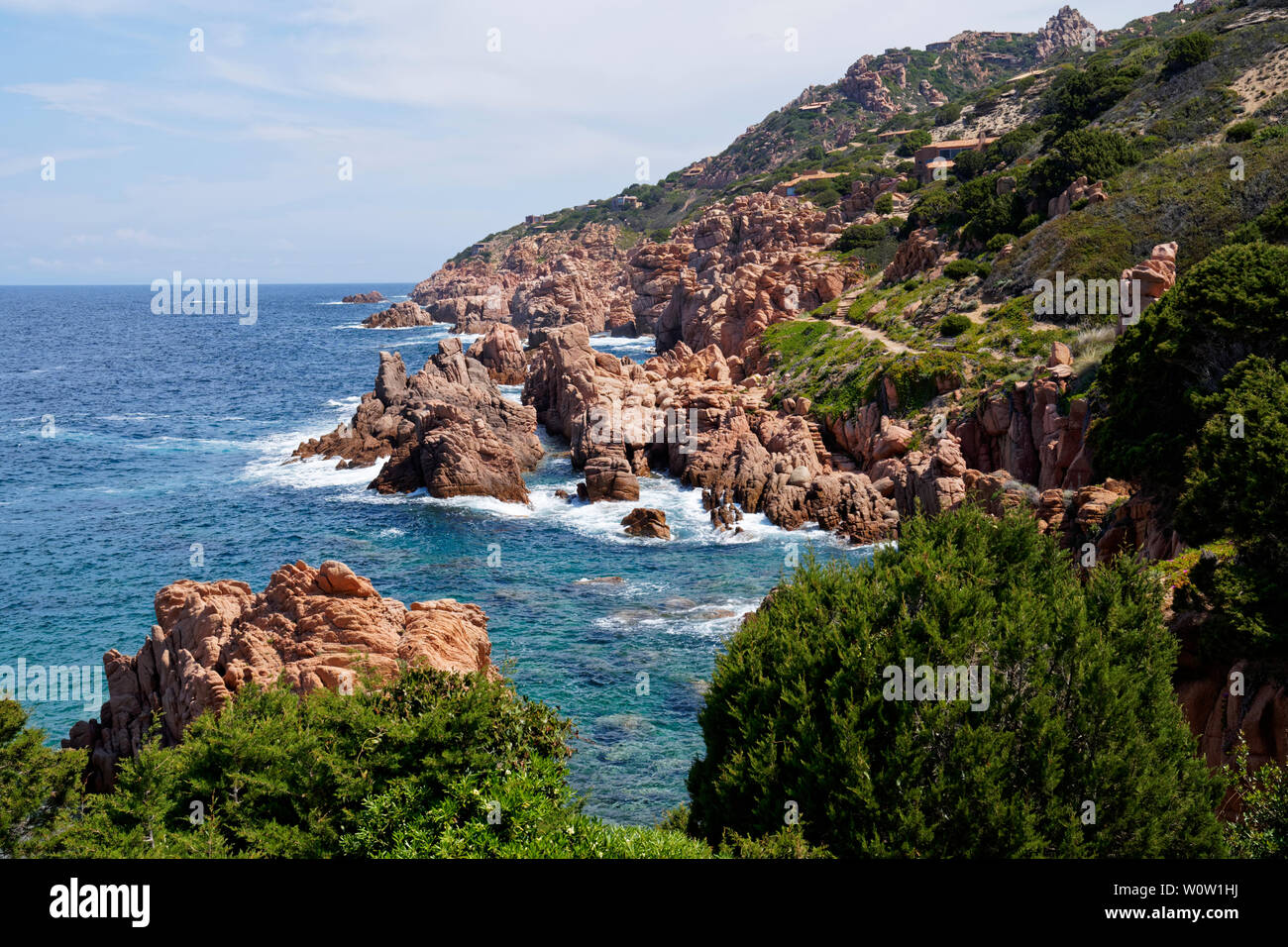 Red rock formation at a beach at Costa Paradiso in Sardinia (Italy ...