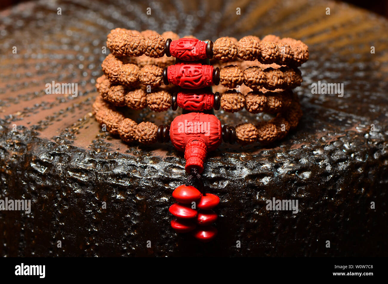 Cinnabar little King Kong Bodhi necklace wool chain Stock Photo - Alamy