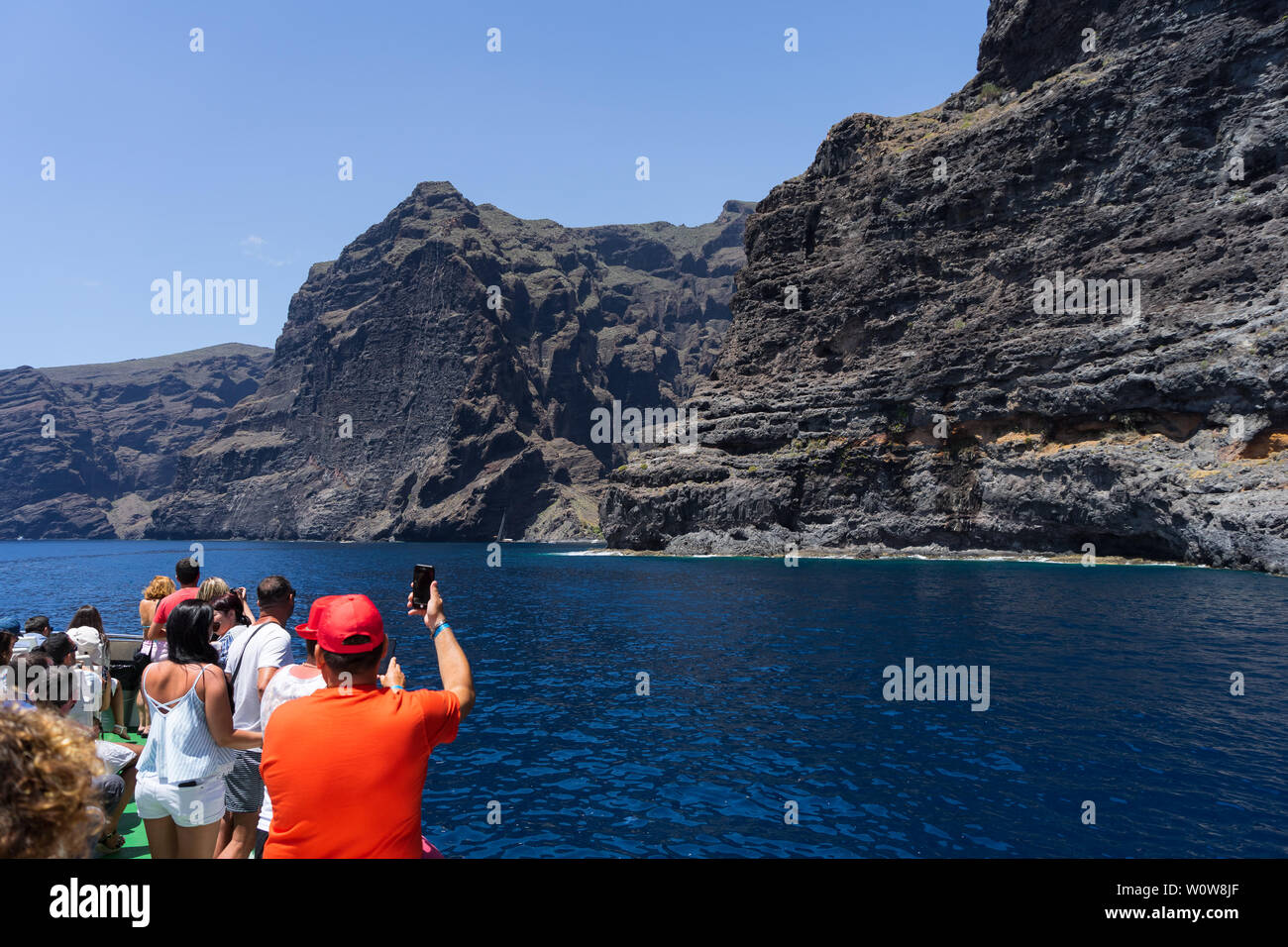 TENERIFE, CANARY ISLANDS, SPAIN - JULY 26, 2018: Tourists take pictures ...