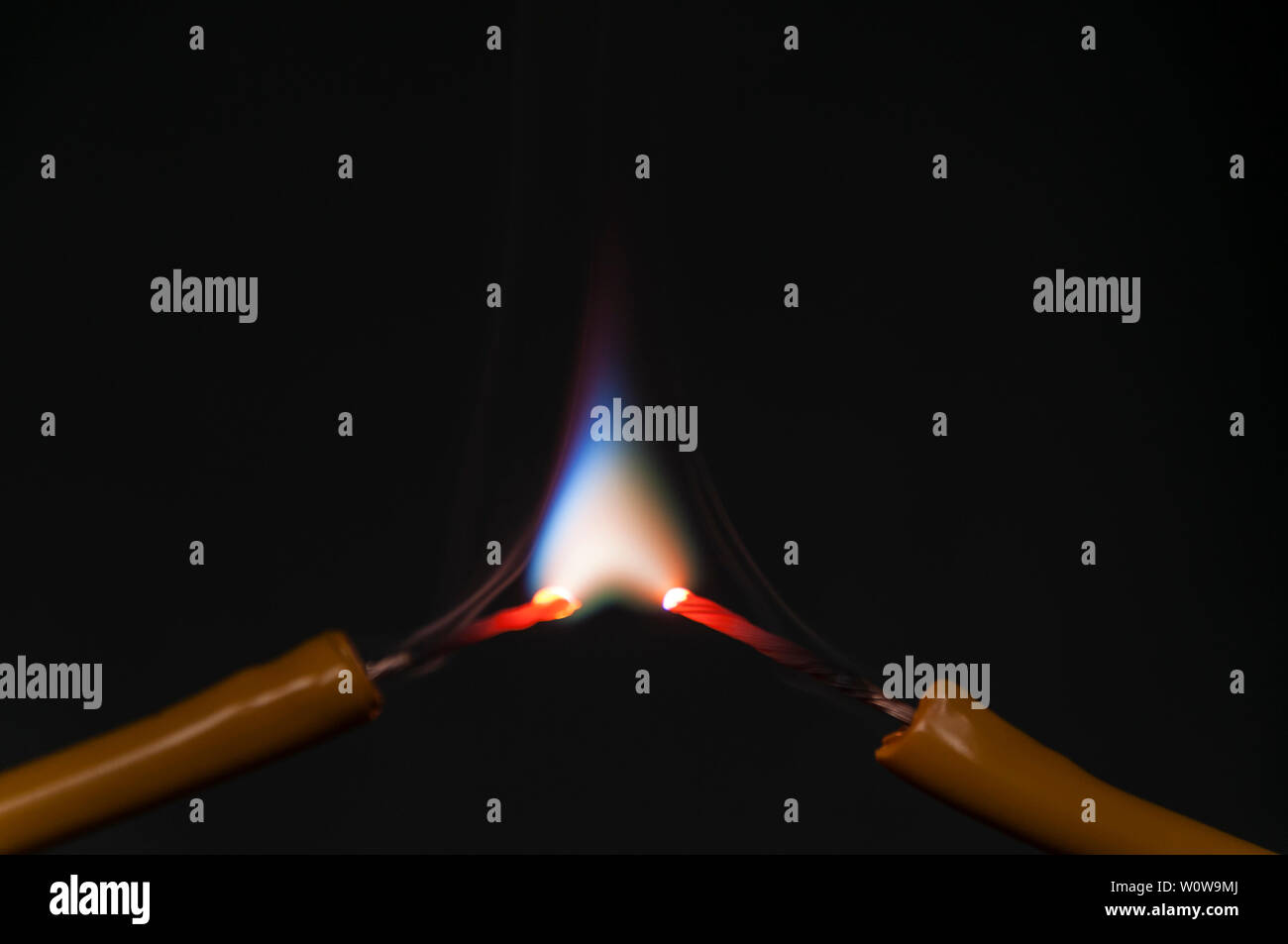 Electric arc between two cables Stock Photo - Alamy